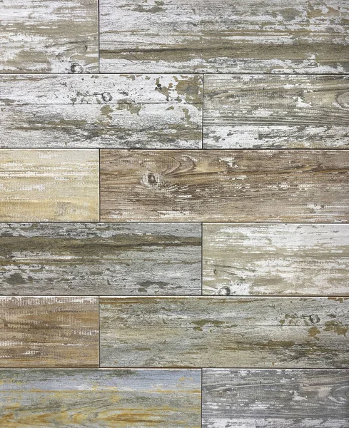 Part of the ceramic tile wall with the texture of an old weathered wood ...