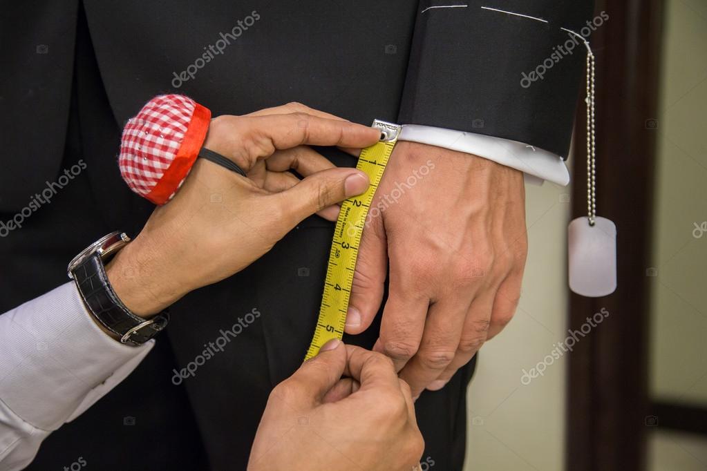 Sewing Tuxedo suits — Stock Photo © katiekk #124041580
