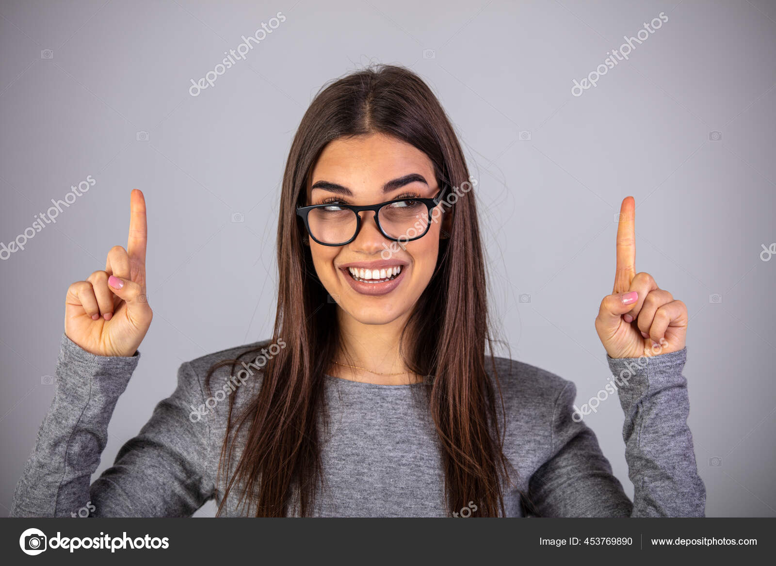 Woman Points Index Fingers Shows Direction Upstairs Smiles Pleasantly ...