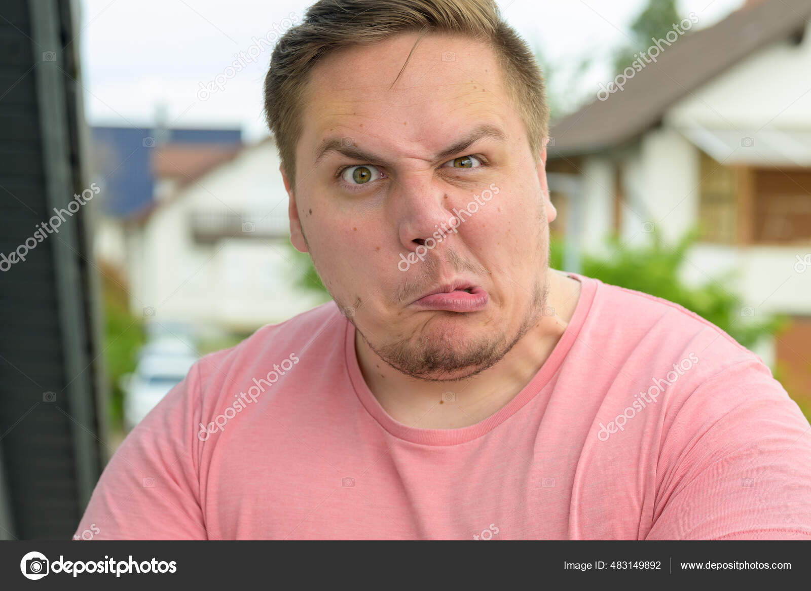 Playful Young Man Pulling Ugly Goofy Face Camera Grimacing Staring ...