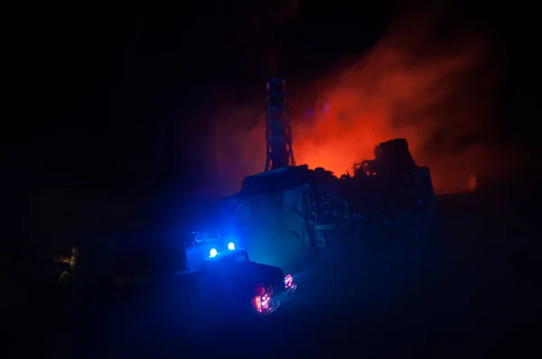 Creative artwork decoration. Chernobyl nuclear power plant at night ...