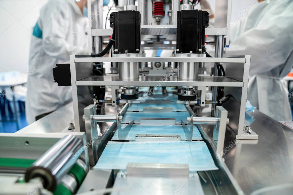 L nea de producci n de mascarillas en f brica moderna 2024
