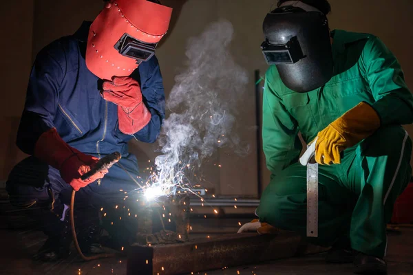 Metal welding steel works using electric arc welding machine - Stock ...