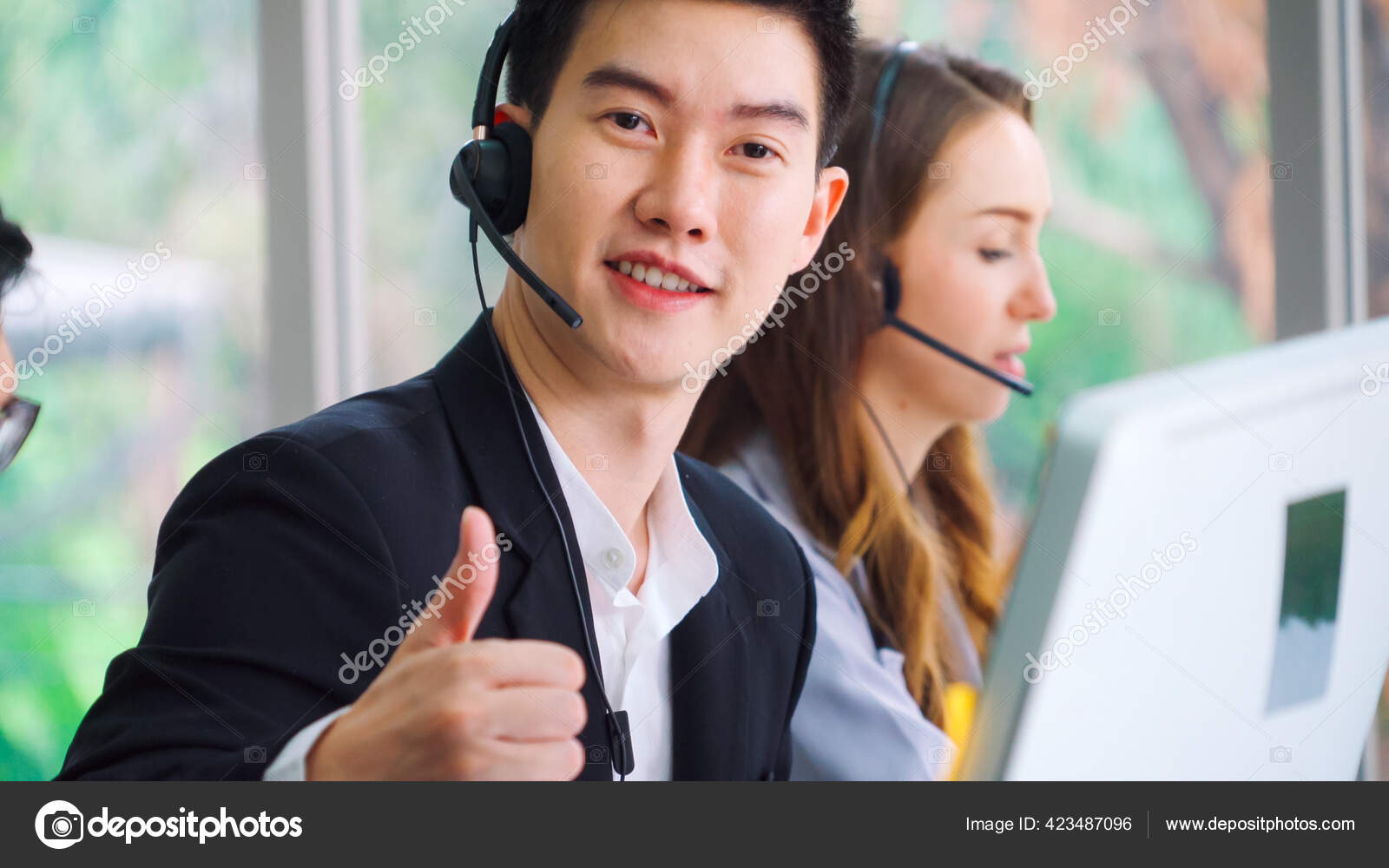 Business people wearing headset working in office — Stock Photo ...